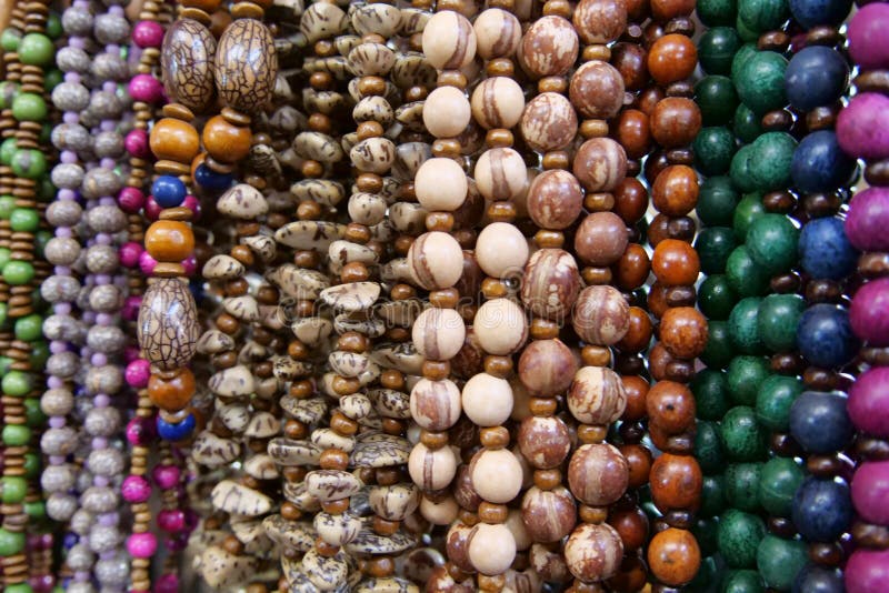 Close Up of Colorful Strings of Decorative Beads and Seeds. Background ...