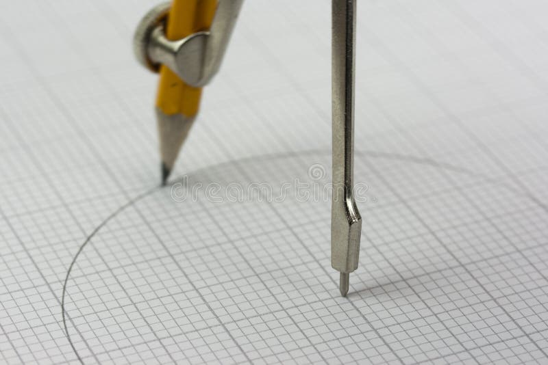 Close Up of a Compass on Graph Paper Stock Image - Image of geometric ...