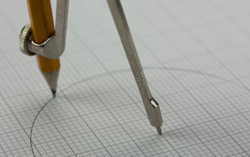 Close Up of a Compass on Graph Paper Stock Image - Image of measure ...