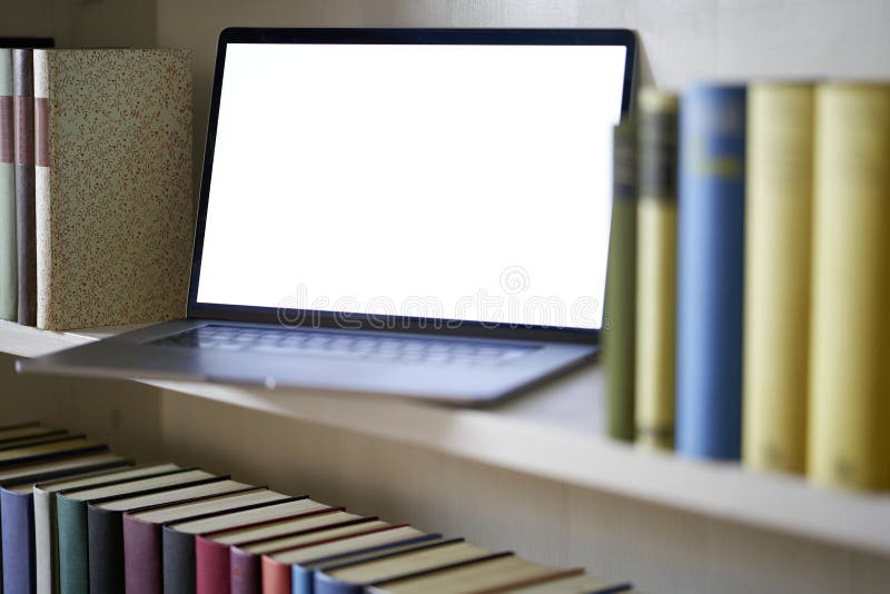Close Up of Computer in Bookcase Stock Photo - Image of keyboard ...