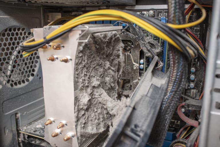 Close-up of a Computer Cooling System Radiator Clogged with Dust and ...