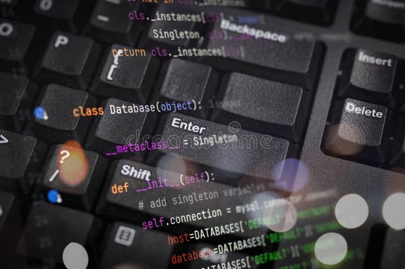 Close-up of Computer Keyboard with Python Code Overlay, Illustrating Software Development ...