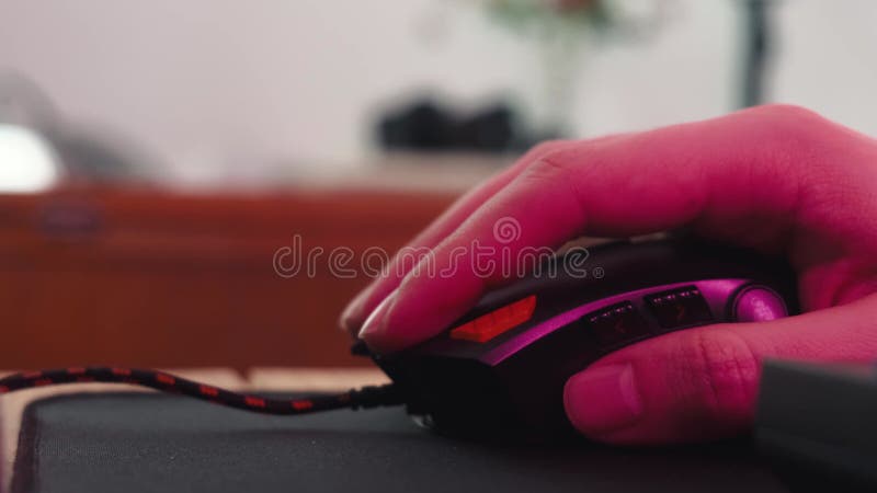 Close-up of a Computer Mouse. a Gamer Uses His Mouse for an Action Game ...