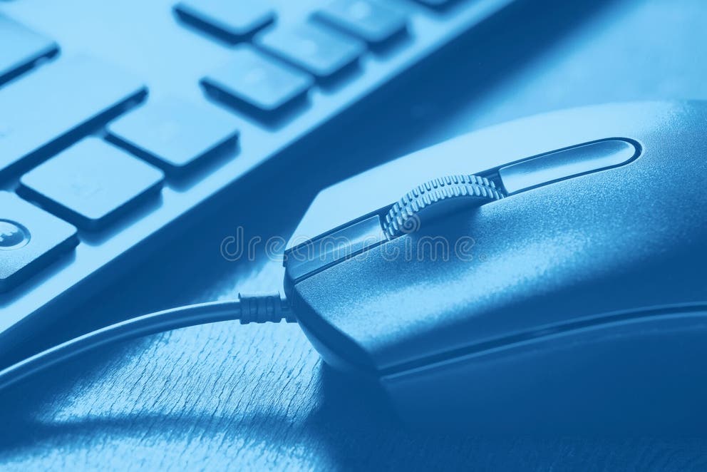 Close-up of a Computer Mouse and Keyboard on a Desktop Stock Image ...