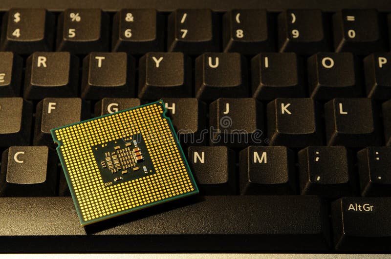 Close Up of Computer Processor CPU on a Keyboard. Background. Tecnology ...