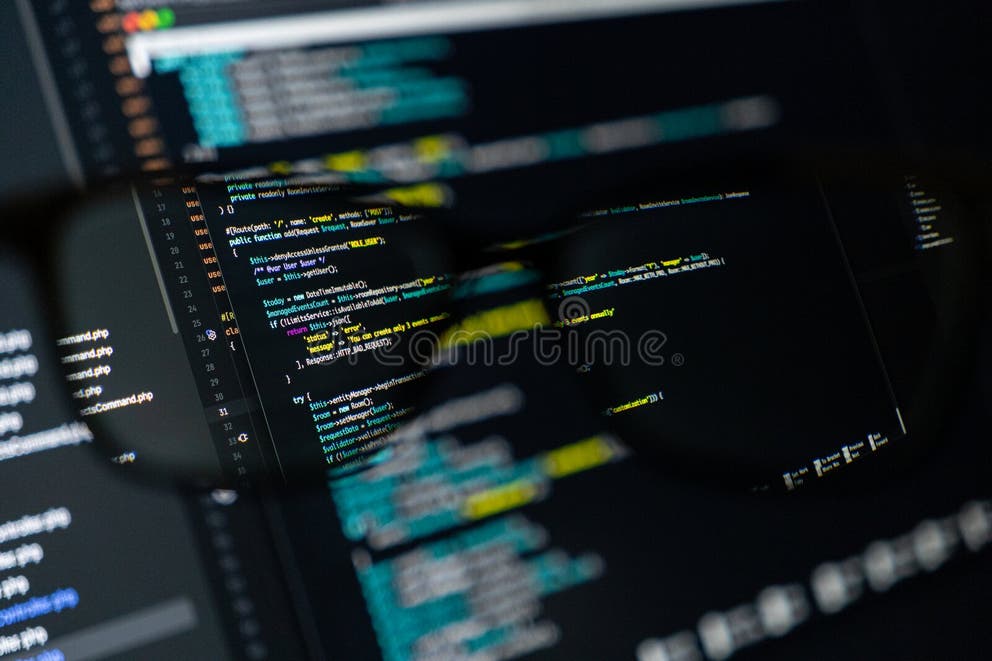 Close-up of Computer Screen with Colorful Code through Eyeglasses, Software Development ...