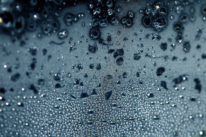 CLose Up of Condensation Bubbles and Marks on a Window Water Background ...