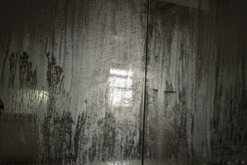Condensation on Mirror with Reflection of Light through Window Stock ...