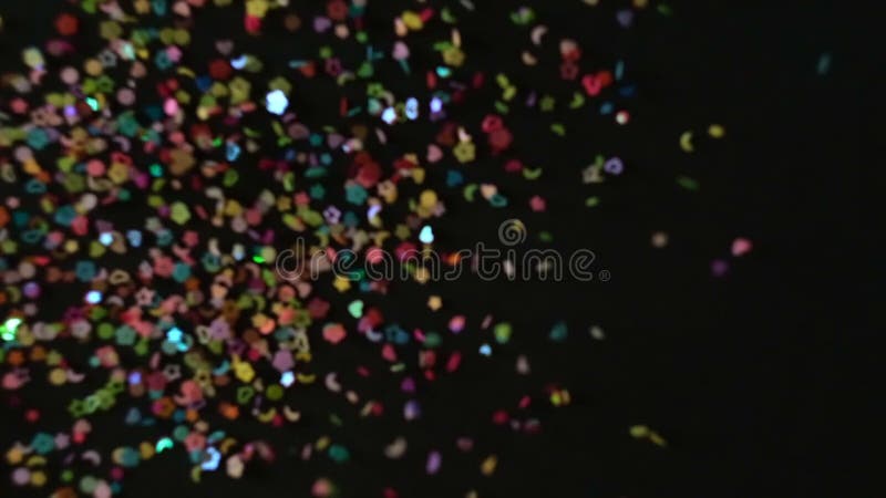 Close Up Confetti Explosion on Black Background. Slow Motion Confetti ...