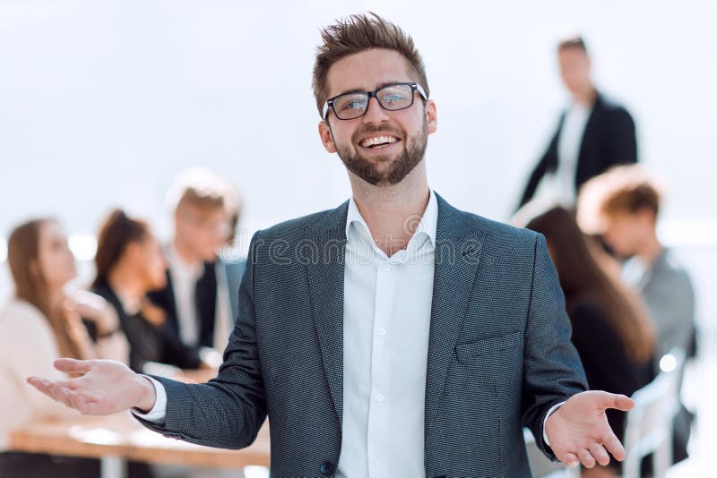 Close Up. Confident Businessman Standing in His Office Stock Photo ... Close Up. Confident Businessman Standing in His Office Stock Photo ...
