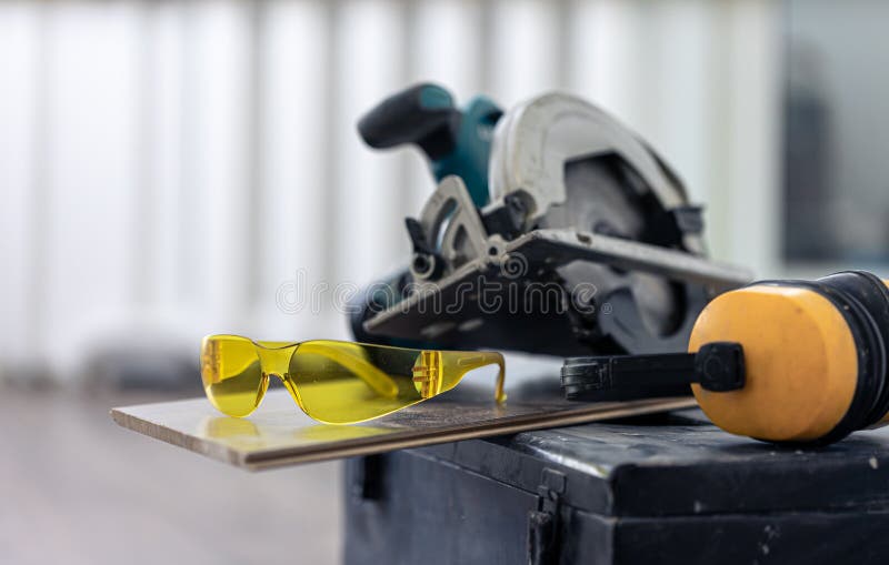 Close Up of Construction Safety Goggles and Work Tools. Stock Photo ...