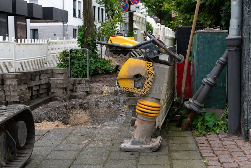 A Close-up of a Construction Site with Vibratory Rammer. Stock Photo ...