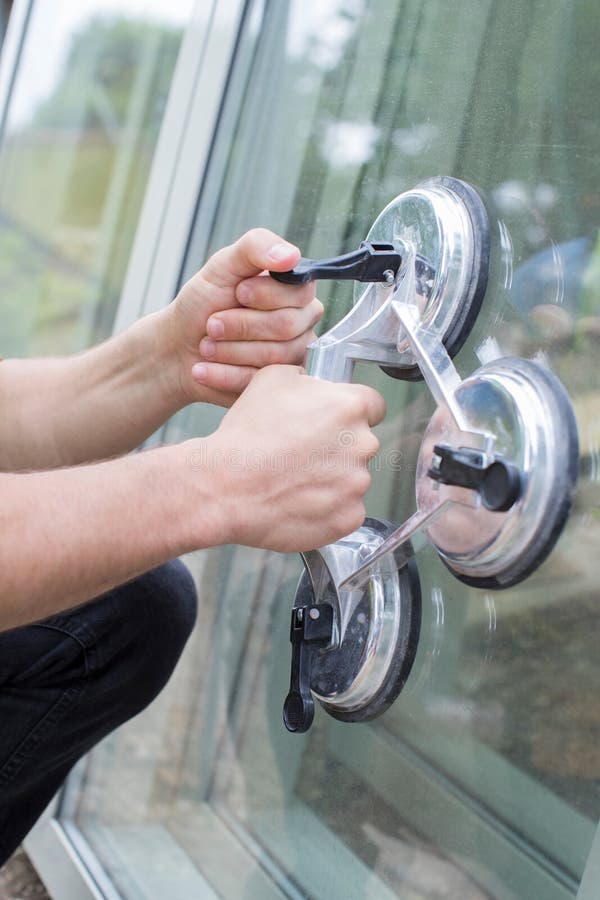 Close Up of Construction Worker Preparing To Fit New Windows Stock ...