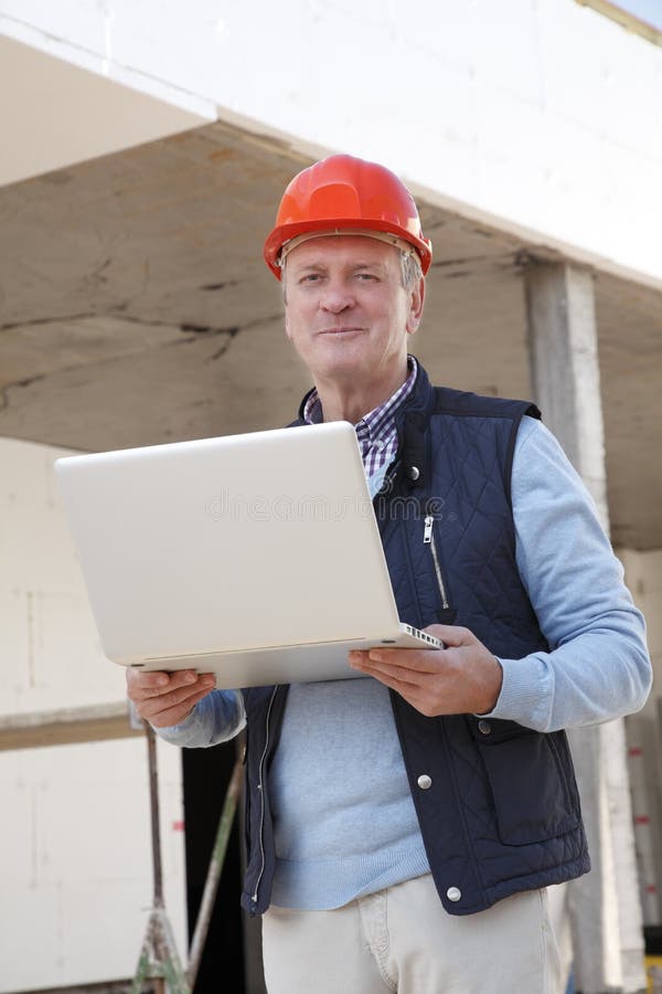 Close-up of Construction Worker Stock Photo - Image of male, blueprint ...