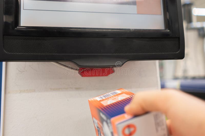 Close Up Consumer Check the Price in the Store Using Rfid Scanners ...