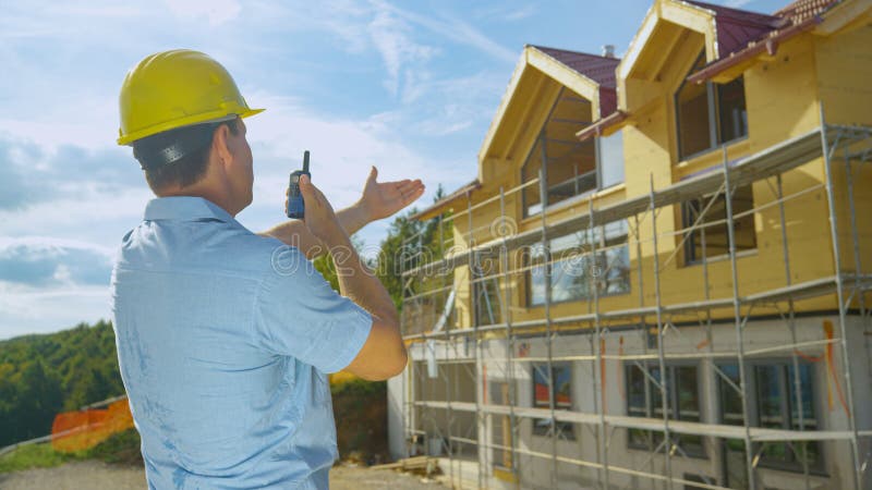 CLOSE UP: Contractor is Unhappy with the Progress at a Construction ...