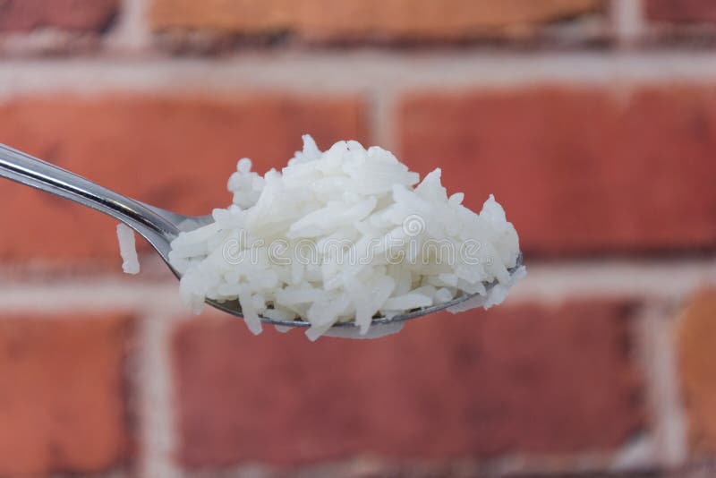 Boiled rice with spoon stock photo. Image of meal, closeup - 106452272