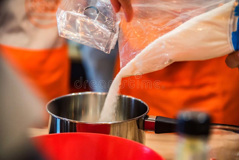 Adding Sugar in Saucpan Close Stock Photo - Image of mixer, agitator ...