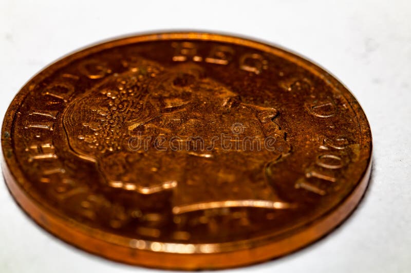 Close-up of a Copper Coin Featuring a Profile Portrait and Embossed ...