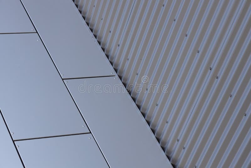 Smooth Metal Wall with Triangular Pattern and Round Openings Stock ...