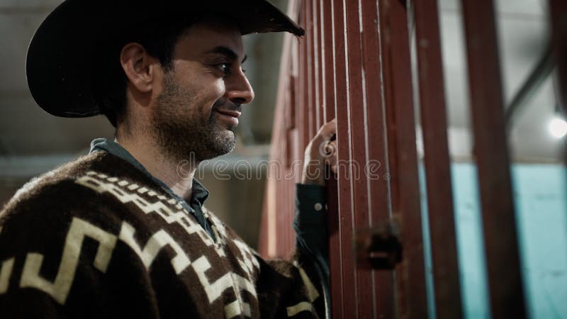 Cowboy Looking into a jail stock footage. Video of prison - 282535828