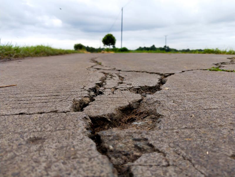 Close-up of Cracks in the Road Stock Photo - Image of agriculture ...