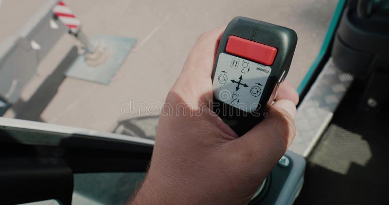 Close-up of a Crane Operator`s Hand on a Control Lever in a Truck Crane ...