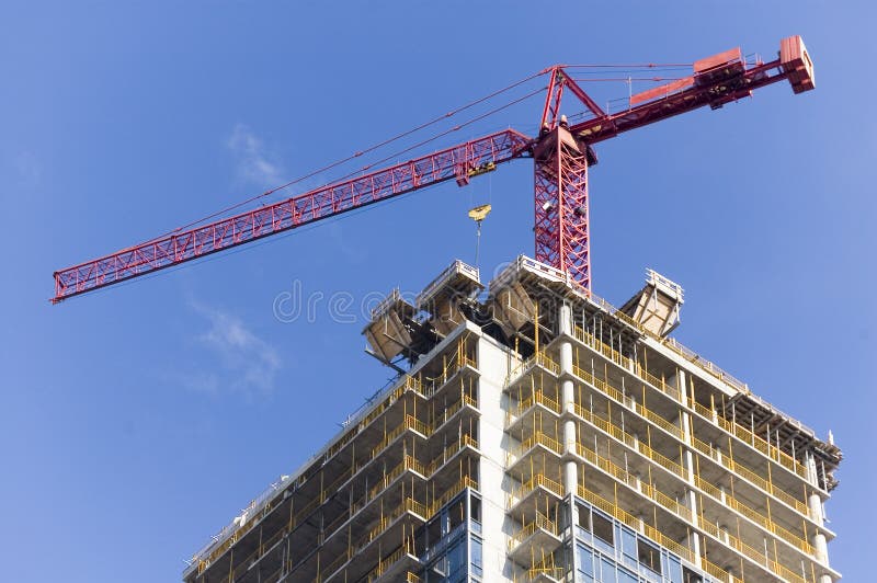 Close Up of Crane on Top of High Rise Building Stock Photo - Image of ...