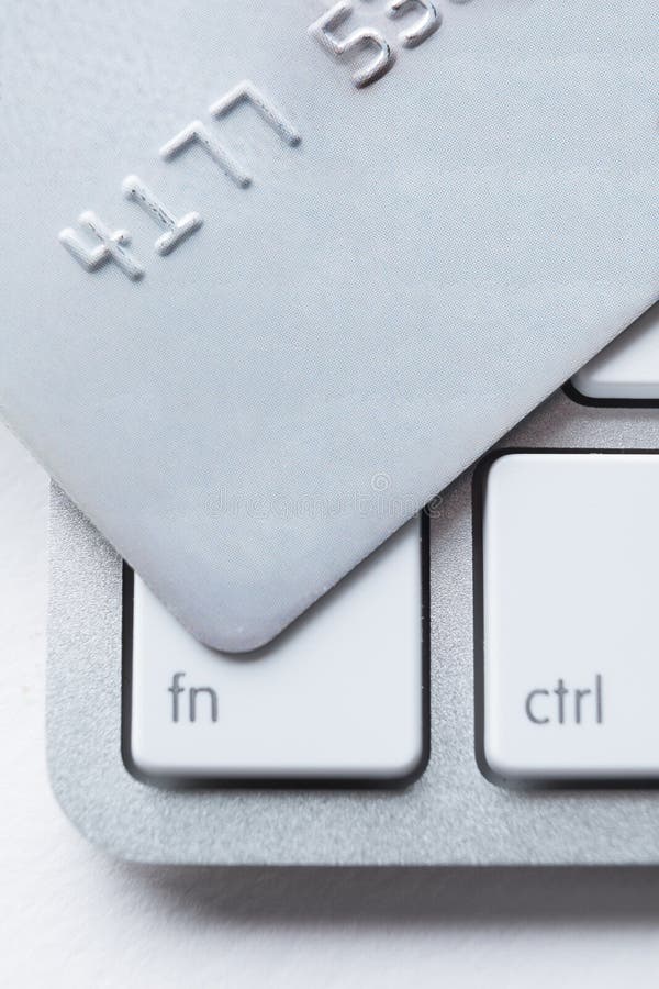 Close Up of Credit Card on a Laptop Keyboard Stock Image - Image of ...
