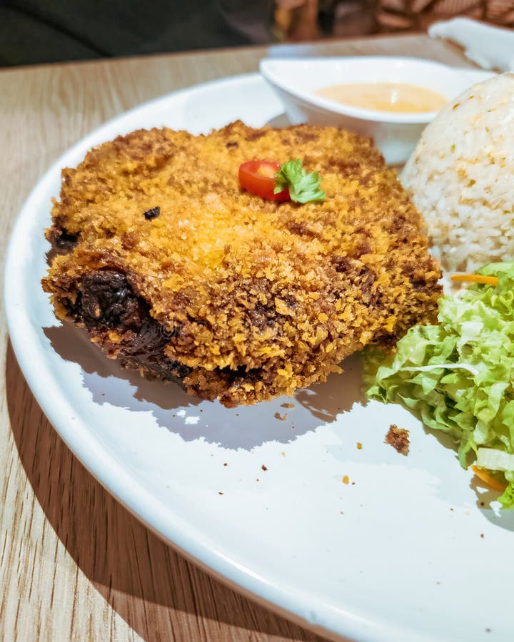 Close-up of the Crispy Chicken Chop Set that Comes with Fried Rice and ...
