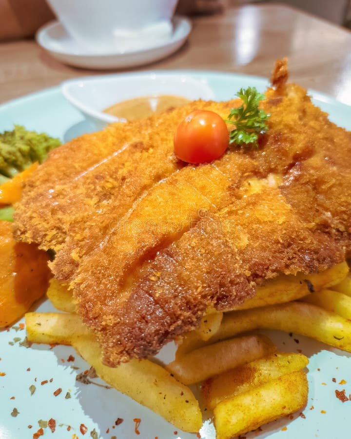 Close-up of the Crispy Chicken Chop Set that Comes with Fried Rice and ...