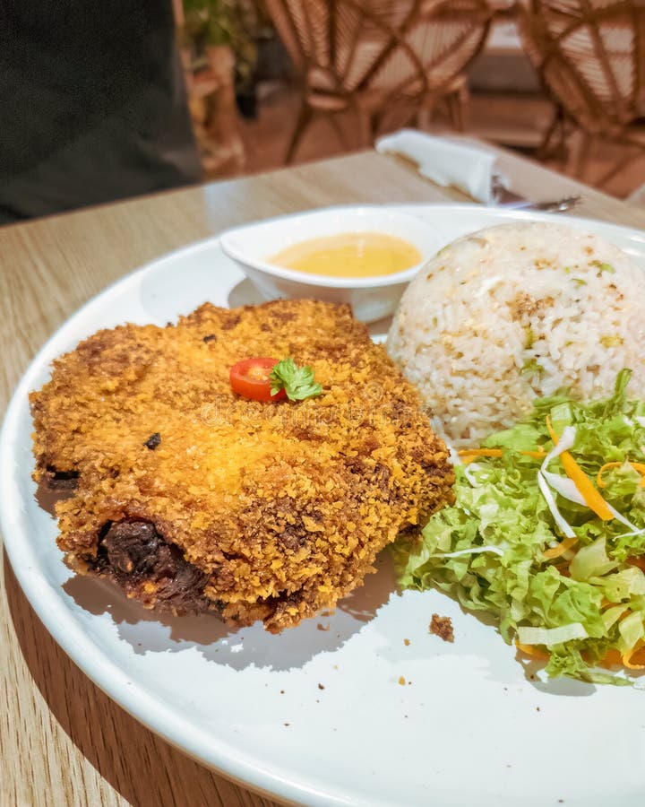 Close-up of the Crispy Chicken Chop Set that Comes with Fried Rice and ...