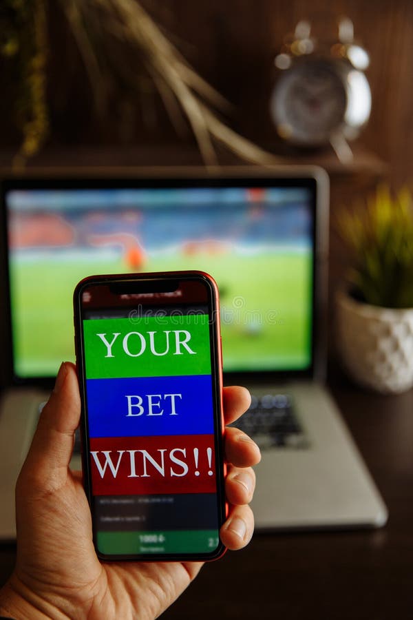 Close-up Cropped Shot of Male Hands Making Bets Using Gambling Mobile ...
