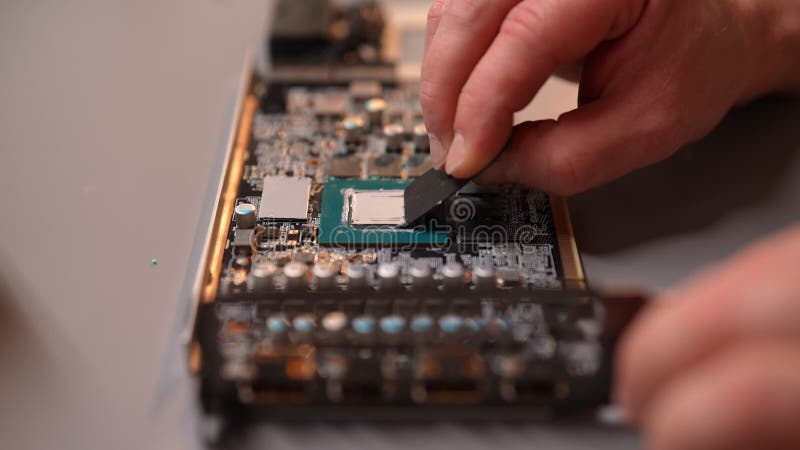 Close-up Cropped Shot of Unrecognizable Man Applying Thermal Paste To ...
