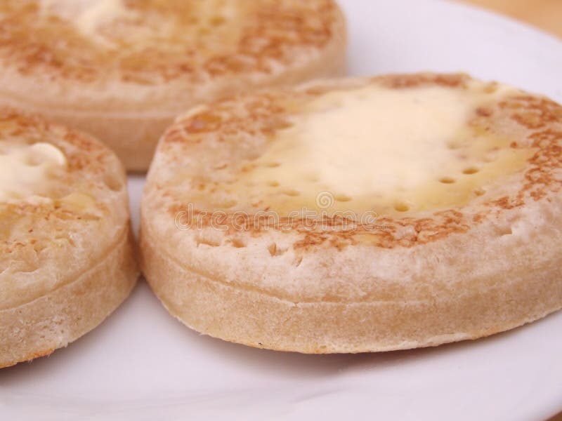 Buttered Crumpets stock image. Image of butter, baked - 2718883
