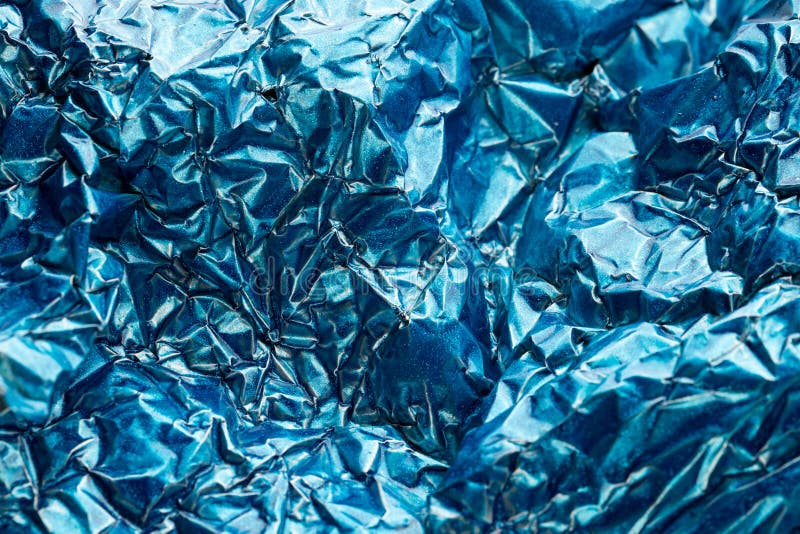 Close Up of Crumpled and Shiny Blue Foil with Copy Space Stock Photo ...