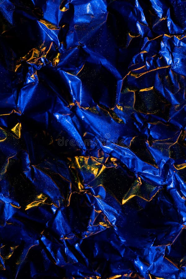 Close Up of Crumpled Shiny Blue and Gold Foil with Copy Space Stock ...