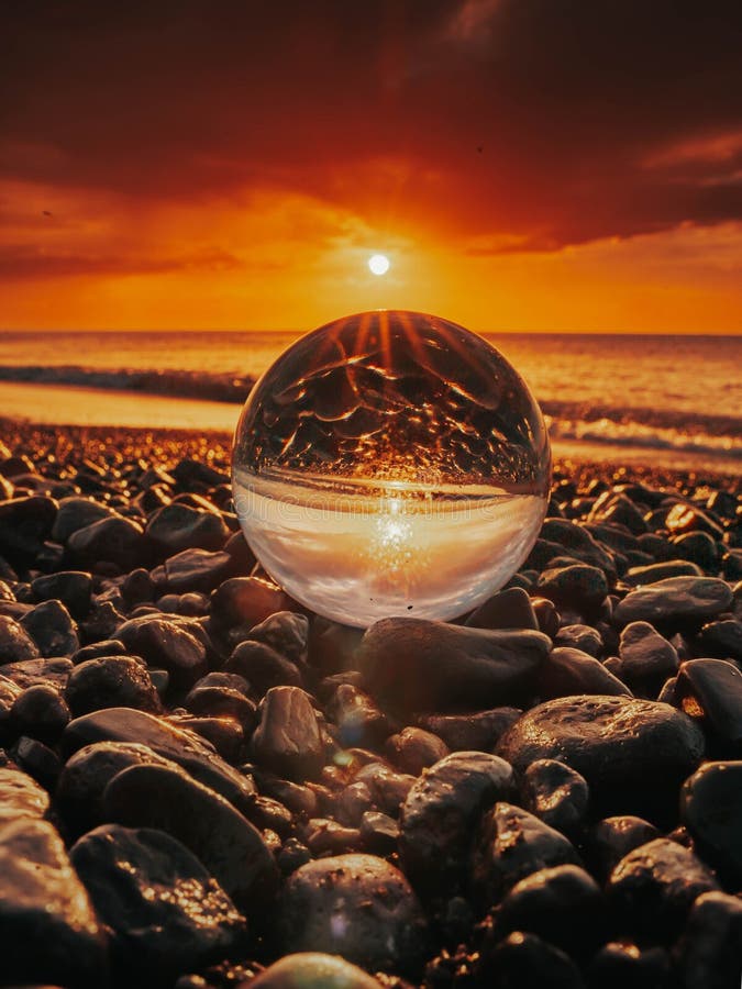 Close Up of a Crystal Ball on a Beach during Sunset Stock Image - Image ...