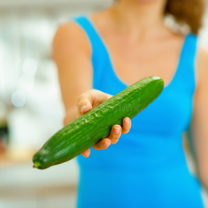 Closeup on Cucumber in Hand of Woman Stock Photo - Image of female ...