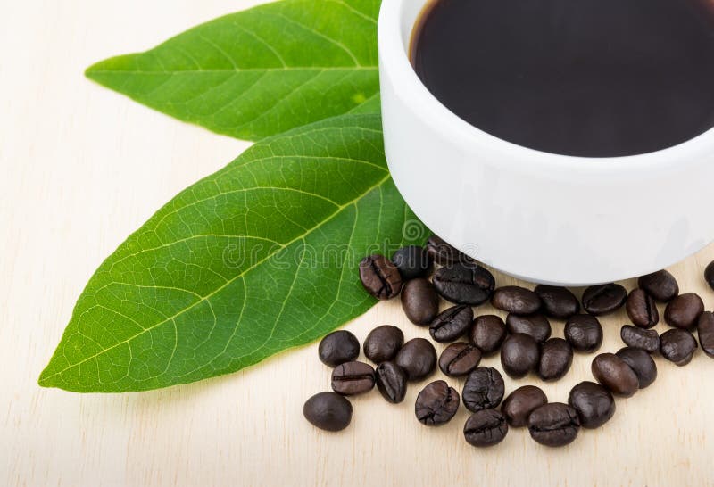 Close Up Cup of Coffee with Green Leaf Stock Photo - Image of black ...