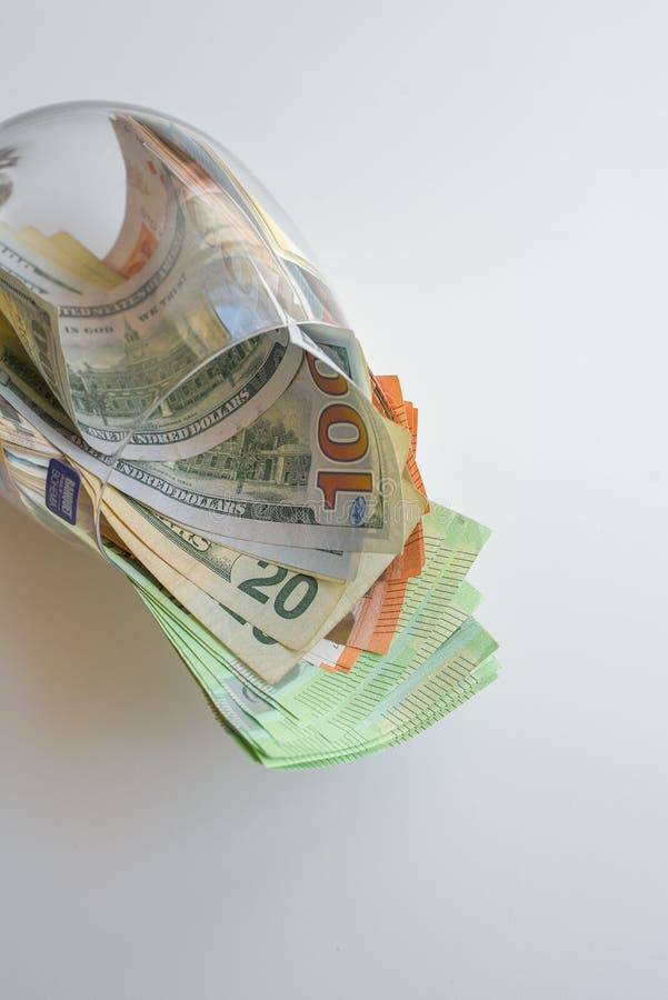 Close Up of a Cup Filled with Different Money Bills Stock Image - Image ...