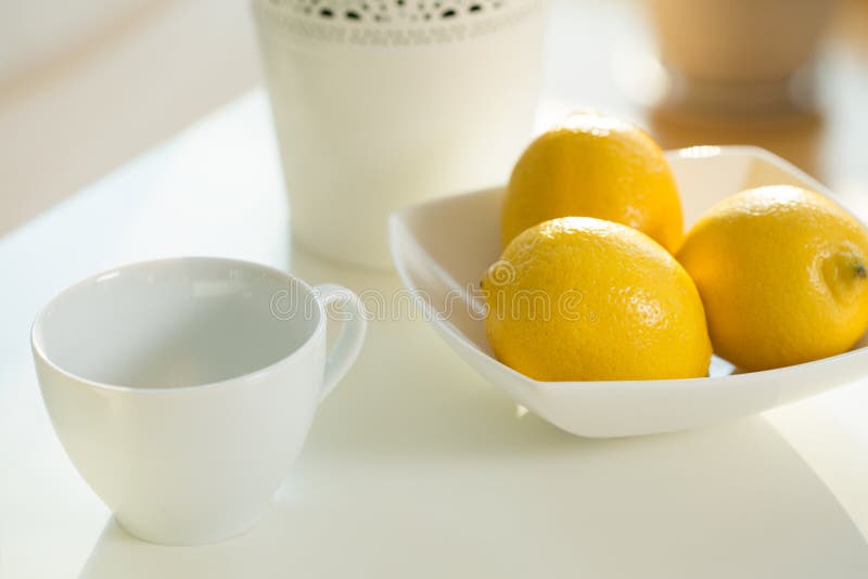 Close up of cup and lemons stock image. Image of decoration - 57091197
