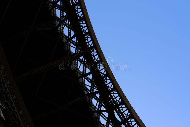 Close Up Curve of Eiffel Tower with Blue Sky Background. Stock Photo ...