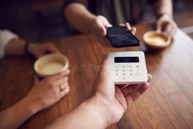 Close Up of Customer Making Contactless Payment in Coffee Shop Using ...