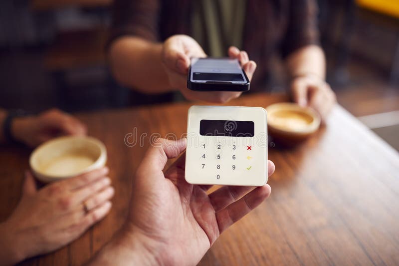Close Up of Customer Making Contactless Payment in Coffee Shop Using ...
