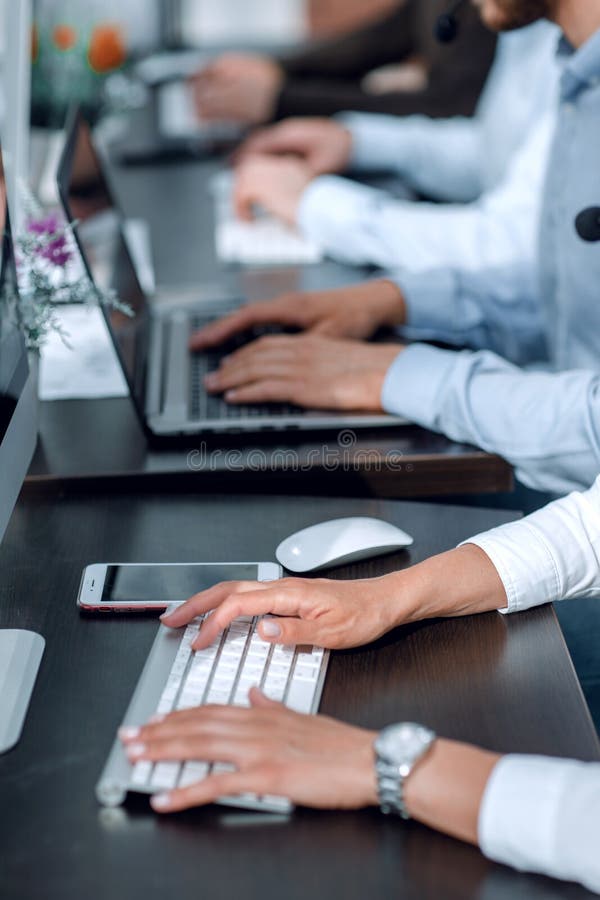 Close Up.customer Service Specialists Work in the Office Stock Photo ...