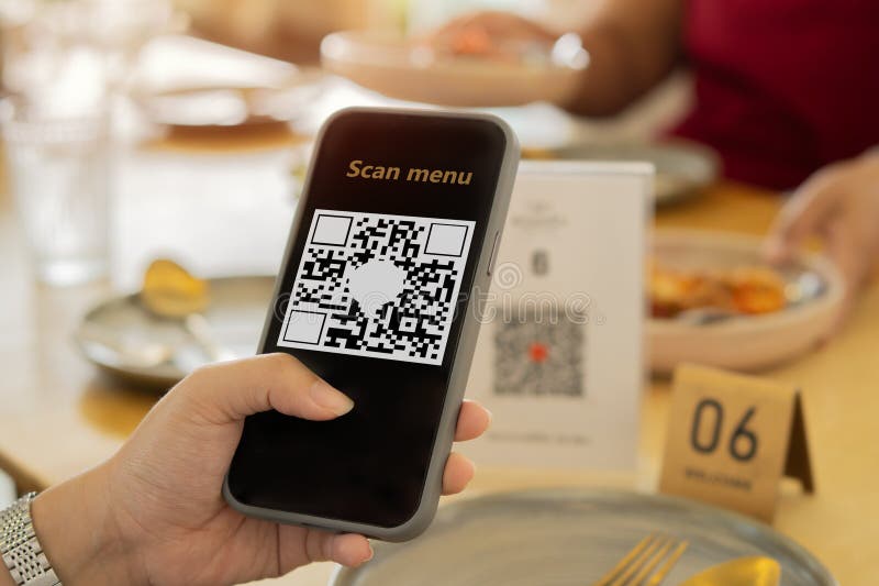 Close-up on Customers Checking the Menu by QR Code at a Restaurant ...