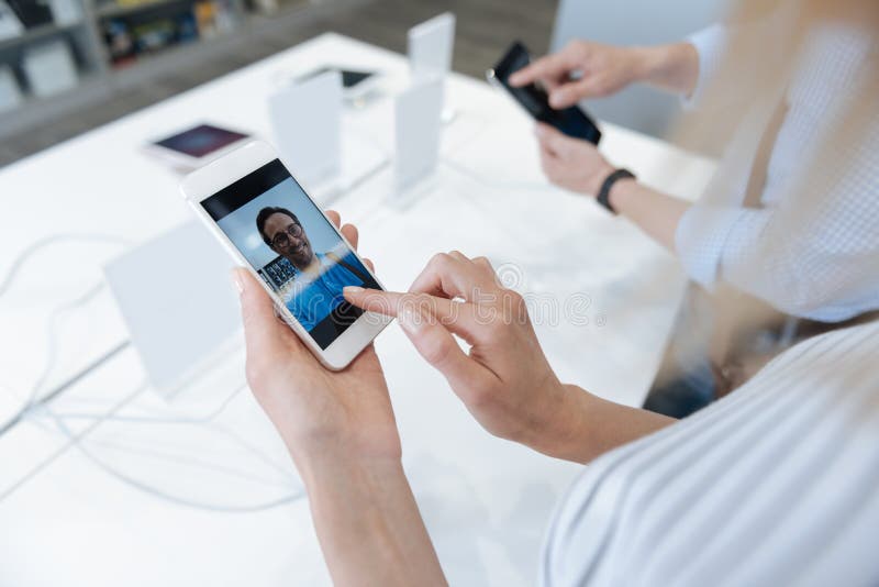 Close Up of Customers Testing Video Calling on Smartphone Stock Photo ...