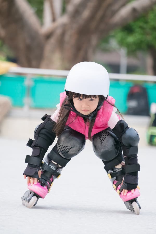 Girl play roller skating stock photo. Image of person - 102365354