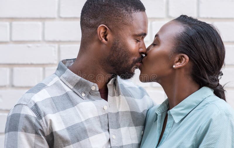 Young African Couple Kissing Each Other In The City Stock Image Image